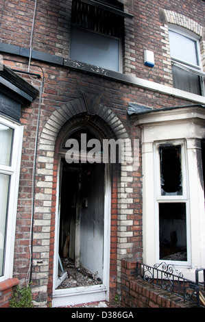Severe house fire front door UPVC Burnt Melted Stock Photo - Alamy