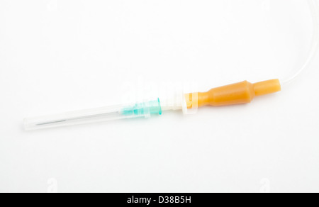 A dropper and a needle lie on a white background, medicine and ...