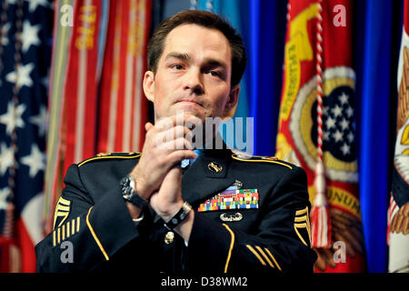 Medal of Honor awardee Army Staff Sergeant Clinton Romesha sings the ...