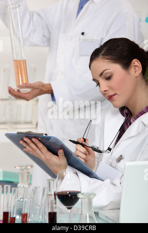 Two scientists hard at work Stock Photo - Alamy