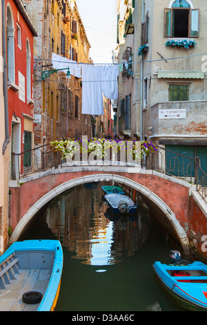 A bridge over a canal in a urban setting Stock Photo - Alamy