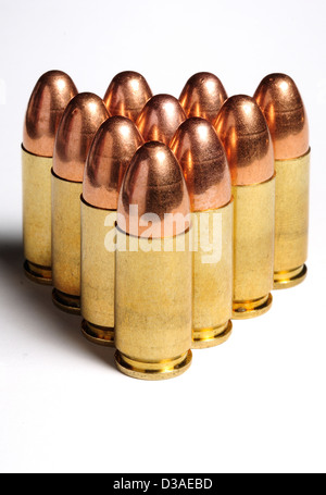 9mm bullets shaped into triangle Stock Photo - Alamy