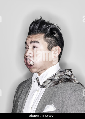 Man making face in wind Stock Photo - Alamy