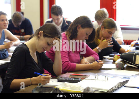 Students attend a mathematics class at a school in the southern village ...