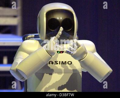 ASIMO (Advanced Step in Innovative MObility) Honda's humanoid robot, as ...