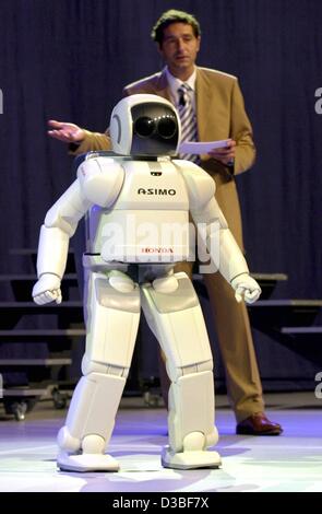 ASIMO (Advanced Step in Innovative MObility) Honda's humanoid robot, as ...