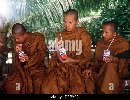 Monks drink Pepsi Stock Photo - Alamy