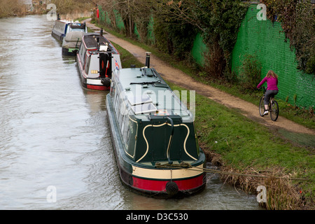 Cycling along the tow path of the River Thames at Ham House, Richmond ...