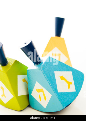 Colorful dreidels on white background Stock Photo - Alamy