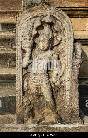 Buddhist history stone carving on sand stone Stock Photo - Alamy