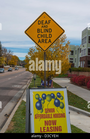 Traffic sign warning for a deaf and blind child area ahead Stock Photo ...