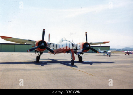 The Grumman F7F Tigercat, seen in this image, is a twin-engine fighter ...
