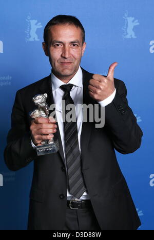 Actor Nazif Mujic poses with the Silver Bear for Best Actor for the ...