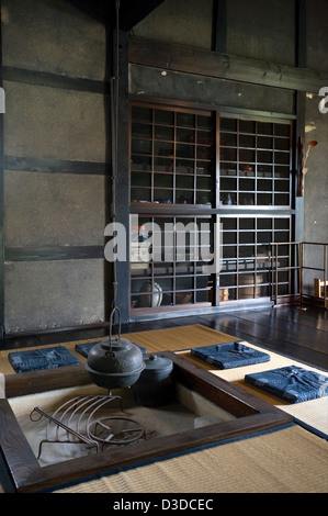 Sunken irori fire pit inside the Kyu Uchiyamake historic Samurai house ...