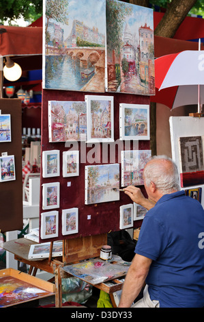Artist at work in the 'Artist Quarters' in Montmartre, Paris, France ...