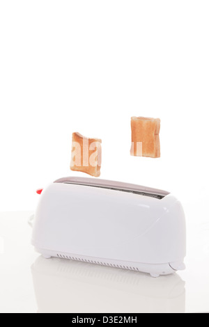 Toast popping out of a toaster Stock Photo - Alamy