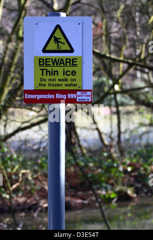 Beware thin ice sign Stock Photo - Alamy