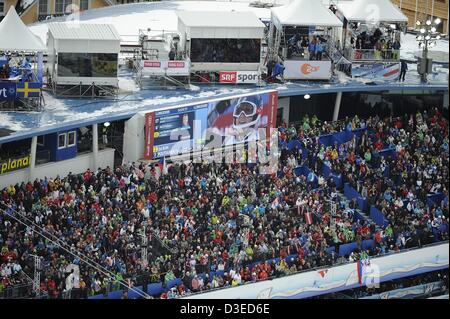 United States' Mikaela Shiffrin stands on podium after winning an ...