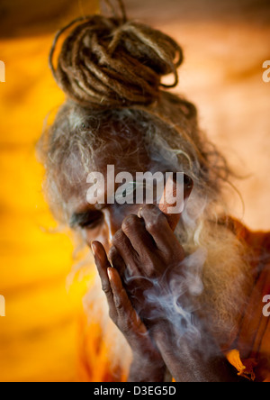 Indian men smoking hashish, Allahabad Kumbh Mela, World’s largest ...