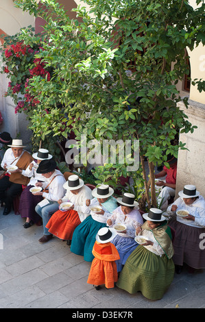 Peru, Ayacucho. Holy Week. Women dressed with typical clothes of ...