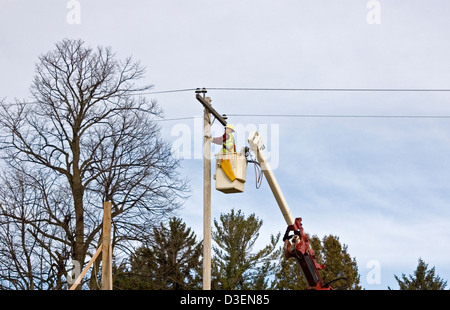 lineman working on electric power line Stock Photo - Alamy