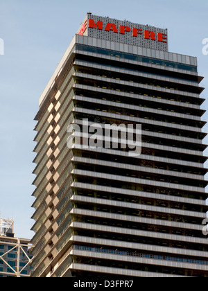 Tall office building Torre Mapfre by Port Olimpic on seafront in Barceloneta. Barcelona ...