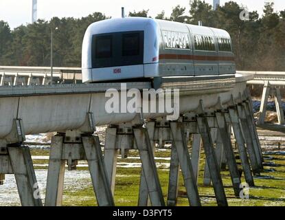 (dpa) - The Transrapid 08 maglev train travels along the test track in ...
