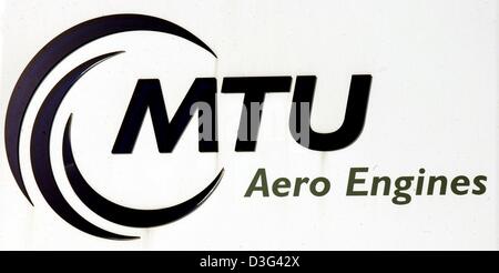 (dpa) - The corporate logo of MTU Aero Engines is pictured in Munich ...