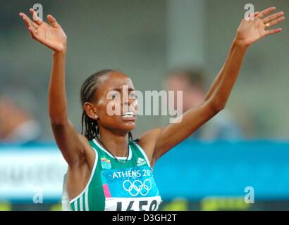 (dpa) - Meseret Defar from Ethiopia celebrates by waving her nation's ...