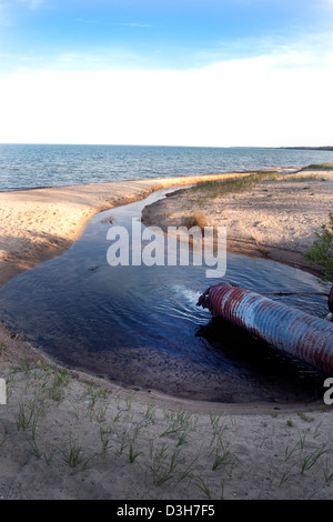 Drain pipe at the beach Stock Photo - Alamy