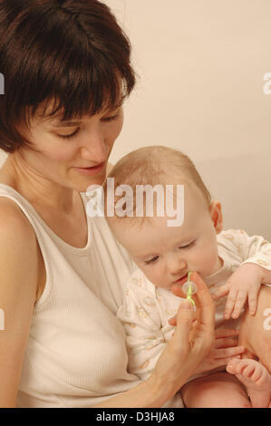INFANT TAKING MEDICATION Stock Photo - Alamy