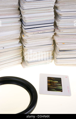 loupe and slide film Stock Photo - Alamy