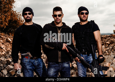 View of a group of gang members with guns Stock Photo - Alamy