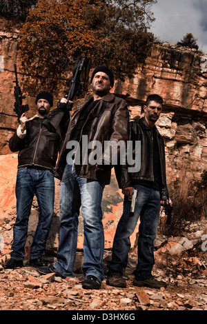 View of a group of gang members with guns Stock Photo - Alamy