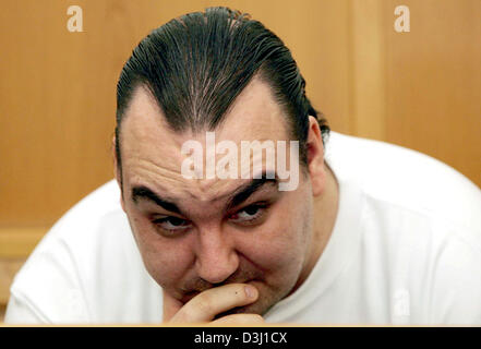 (dpa) - Defendant Marc Hoffmann looks worried at the District Court in ...