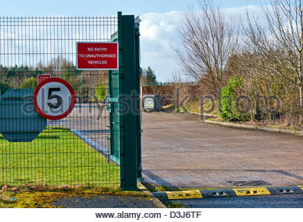 a british no entry sign, a speed limit sign, and a notice restricting ...