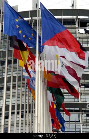 European Union flags flap in the wind outside of EU headquarters in ...