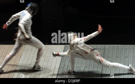 (dpa) - Two epee fencers in a fight during the German Fencing ...