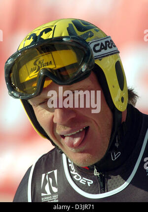 (dpa) - Austrian skier Hermann Maier smiles as he poses with the ...