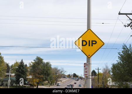 Traffic sign warning for a dip in the road Stock Photo - Alamy