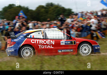 race driver in blue overall with helmet training on simracing aluminum ...