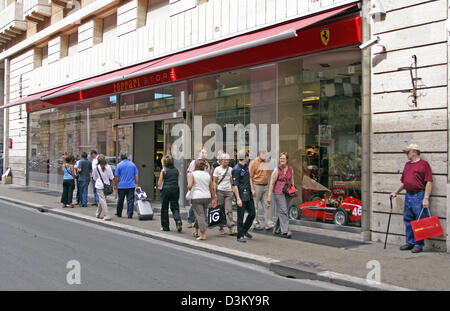 The Ferrari store in Rome, Italy, with a formula one racing car in the ...