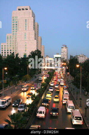 Street view, downtown Damascus, Syria featuring a man from behind ...
