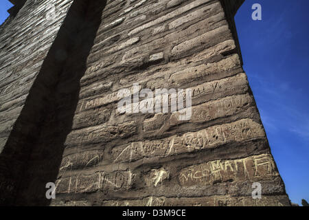 Graffiti from several centuries carved into the walls of the Colosseum ...