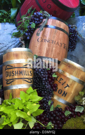 Wine barrel and grape display Stock Photo - Alamy
