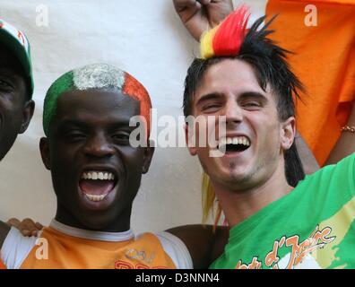 Ivory Coast supporters cheer in support of their team during the FIFA ...