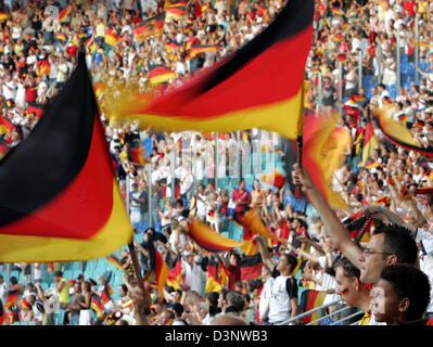 Fans watch a live broadcast of a FIFA World Cup soccer match between ...