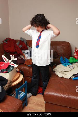 Children getting dressed at school Stock Photo - Alamy