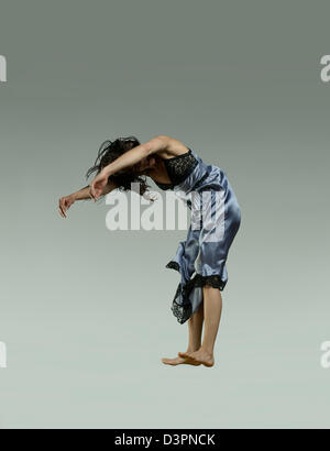 Humans floating frozen in mid air Stock Photo - Alamy