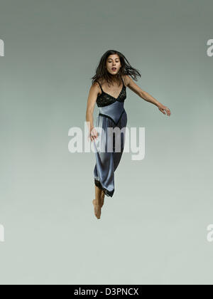 Humans floating frozen in mid air Stock Photo - Alamy